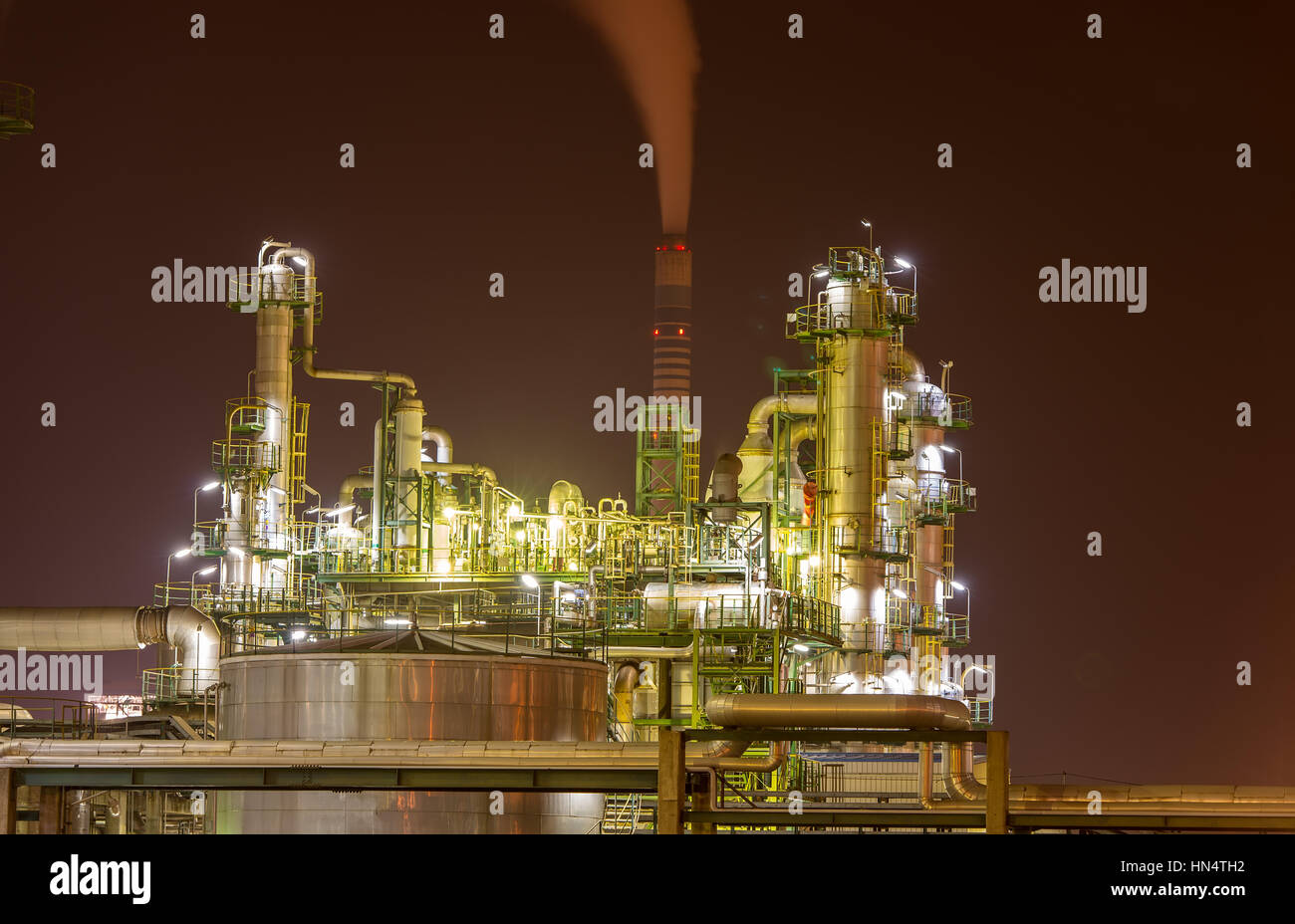 Refinery industrial plant with Industry boiler at night Stock Photo - Alamy