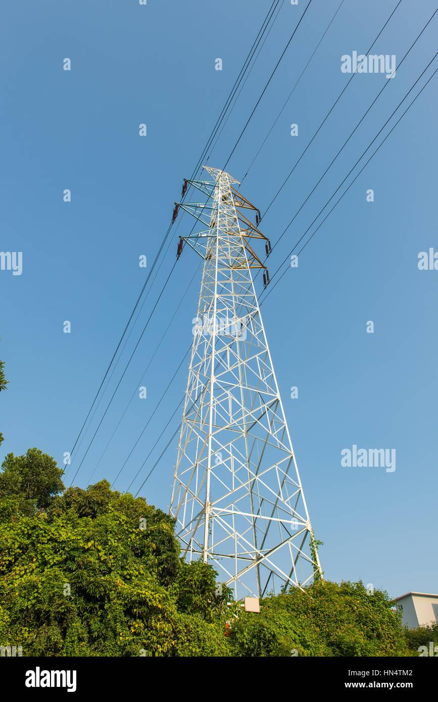 electric pillar over blue sky Stock Photo - Alamy