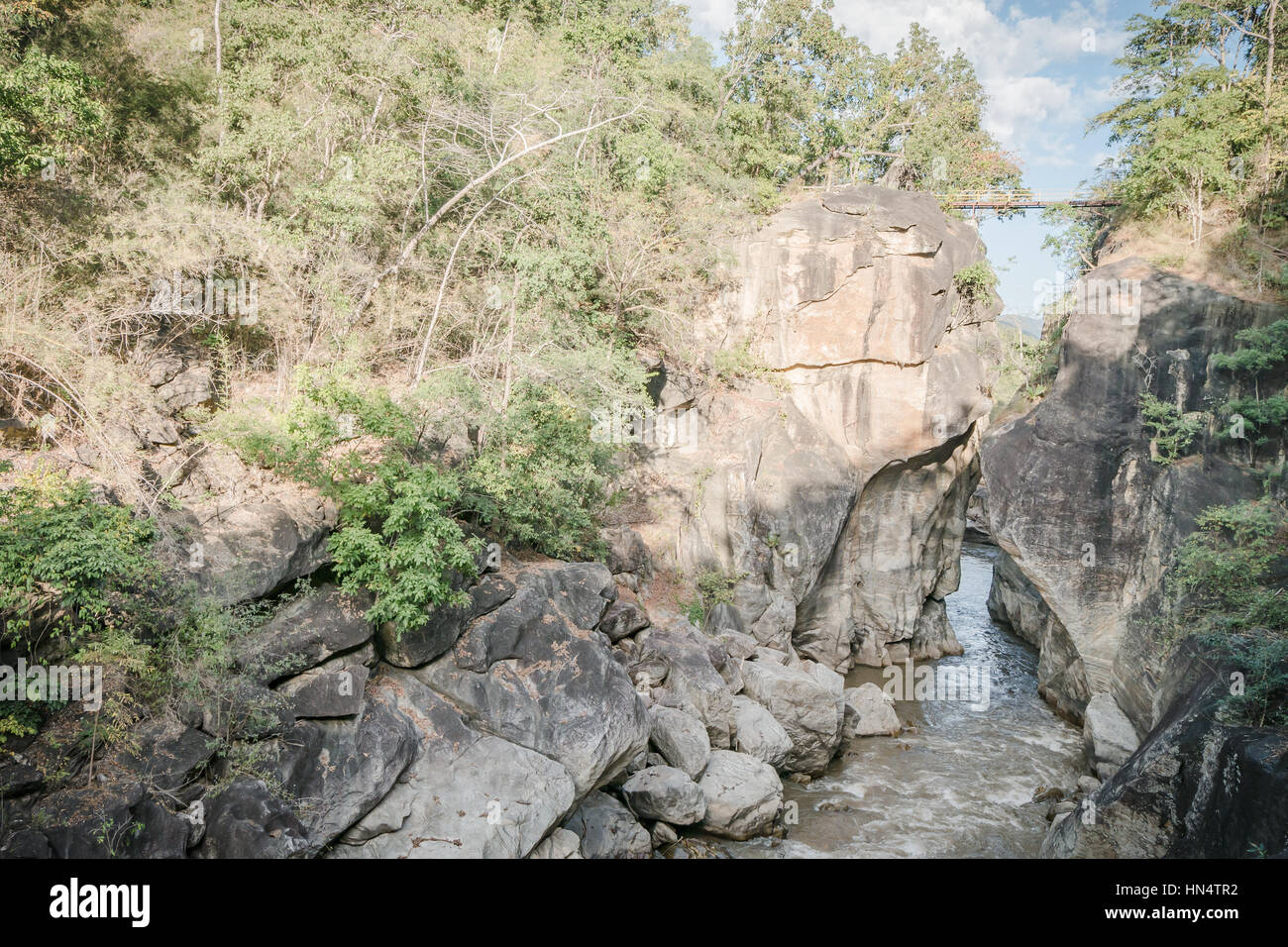 Small bridge over the river with big cliff at Ob Luang National Park ...