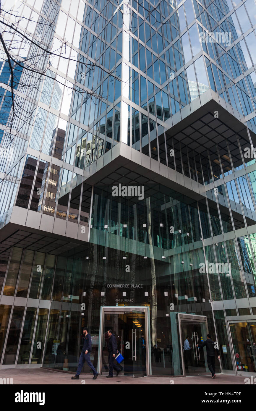 People entering and leaving a downtown office tower Stock Photo - Alamy