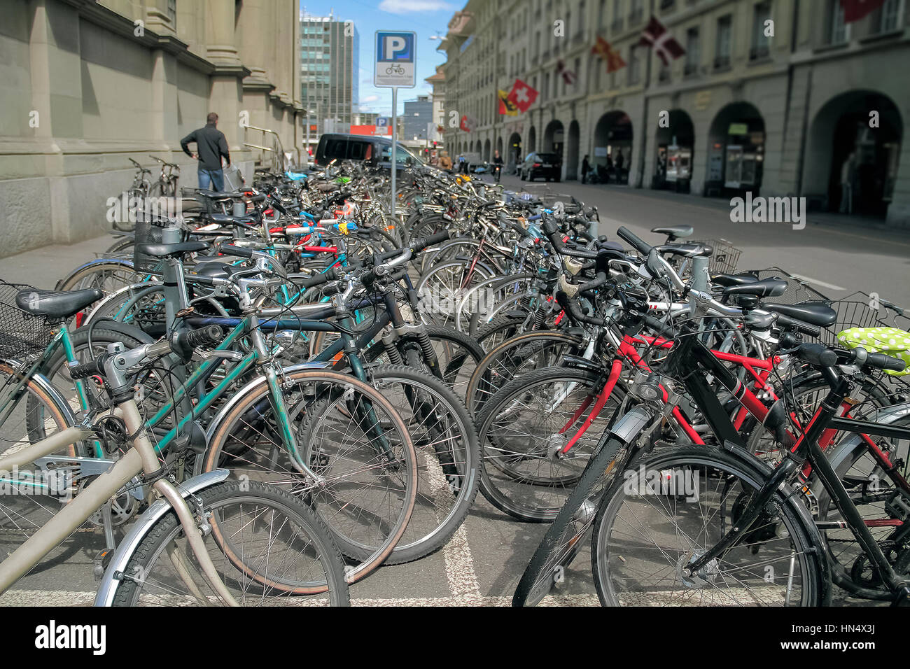 Many beautiful bikes in the big parking lot Stock Photo - Alamy