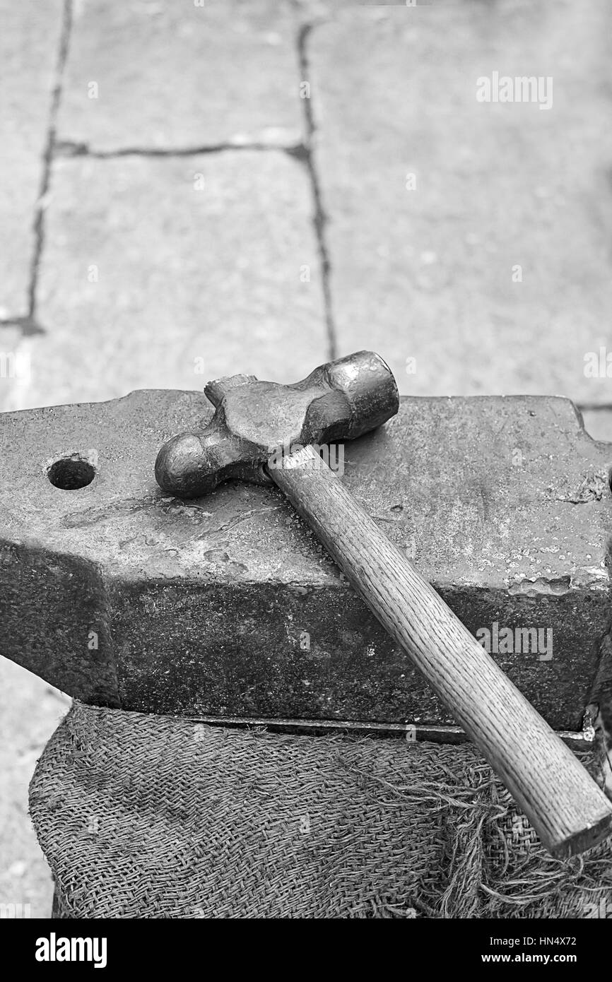 Hammer anvil artisan workshop work and profession Stock Photo - Alamy