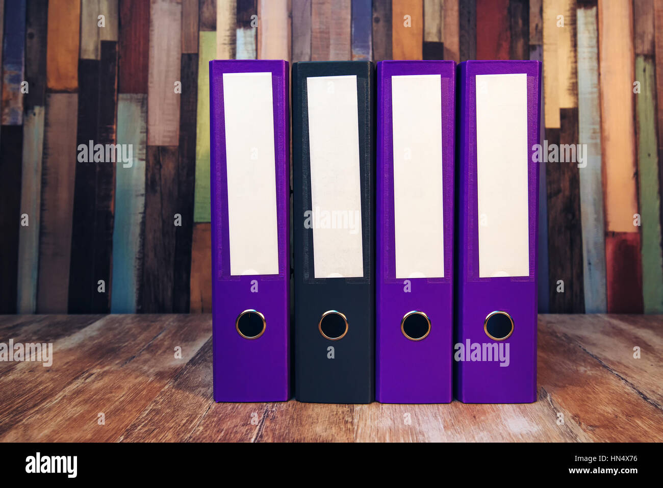 Four document ring binders with blank labels on accountant's office ...