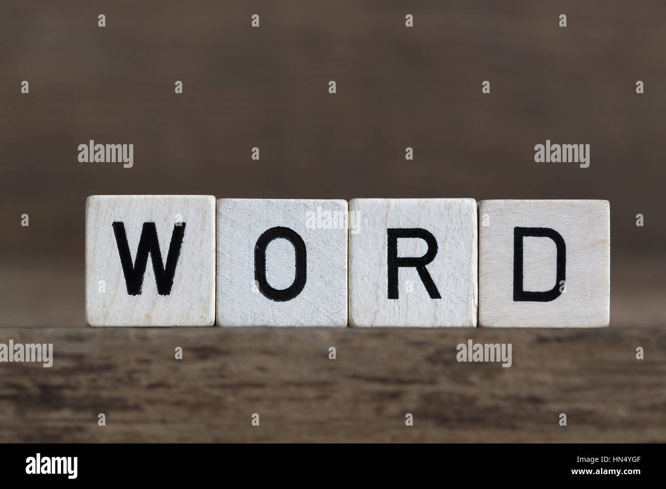 Word, written in cubes on a wooden background Stock Photo - Alamy