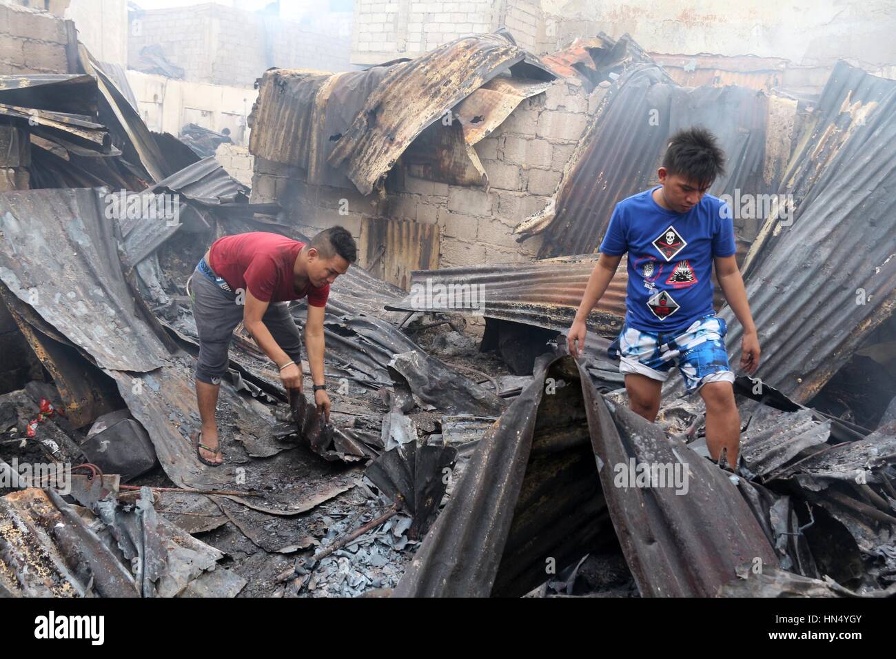 Manila, Philippines. 08th Feb, 2017. The fire victims collecting some ...
