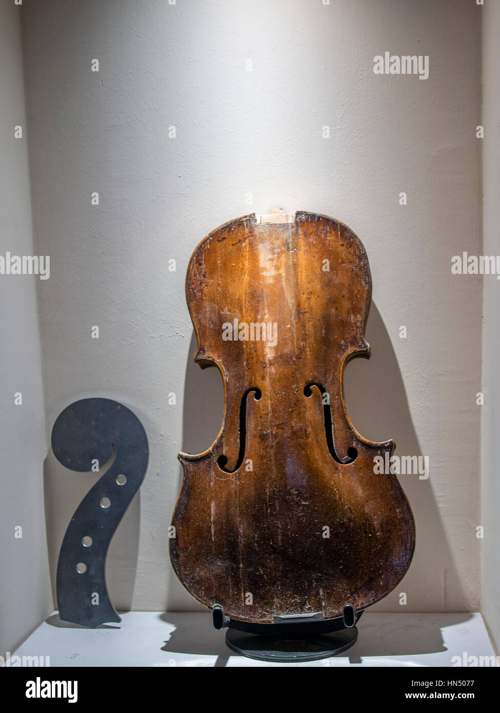 Old violin and metal scroll tool Stock Photo - Alamy