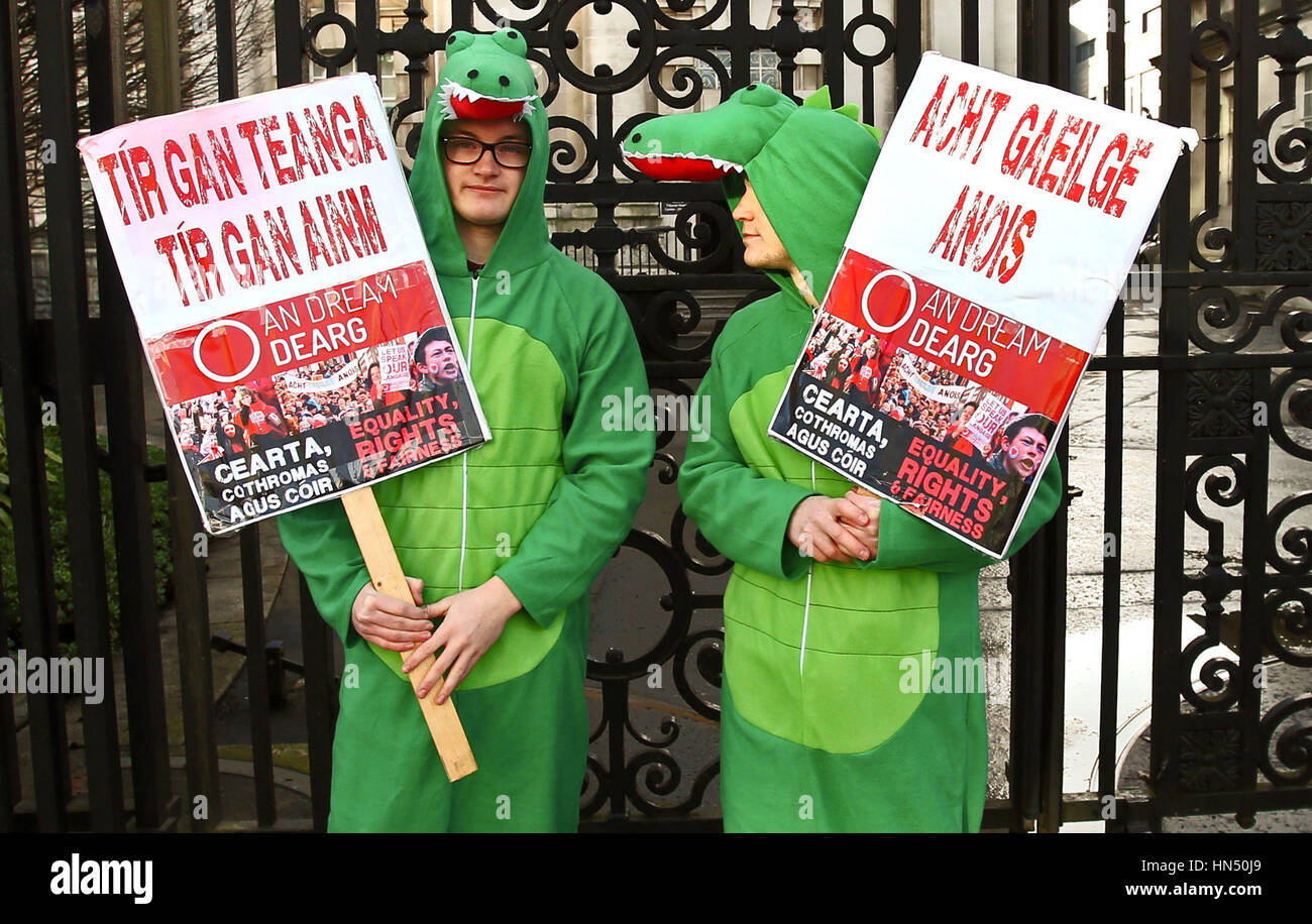 Irish language campaigners dressed as crocodiles protest over Stormont ...