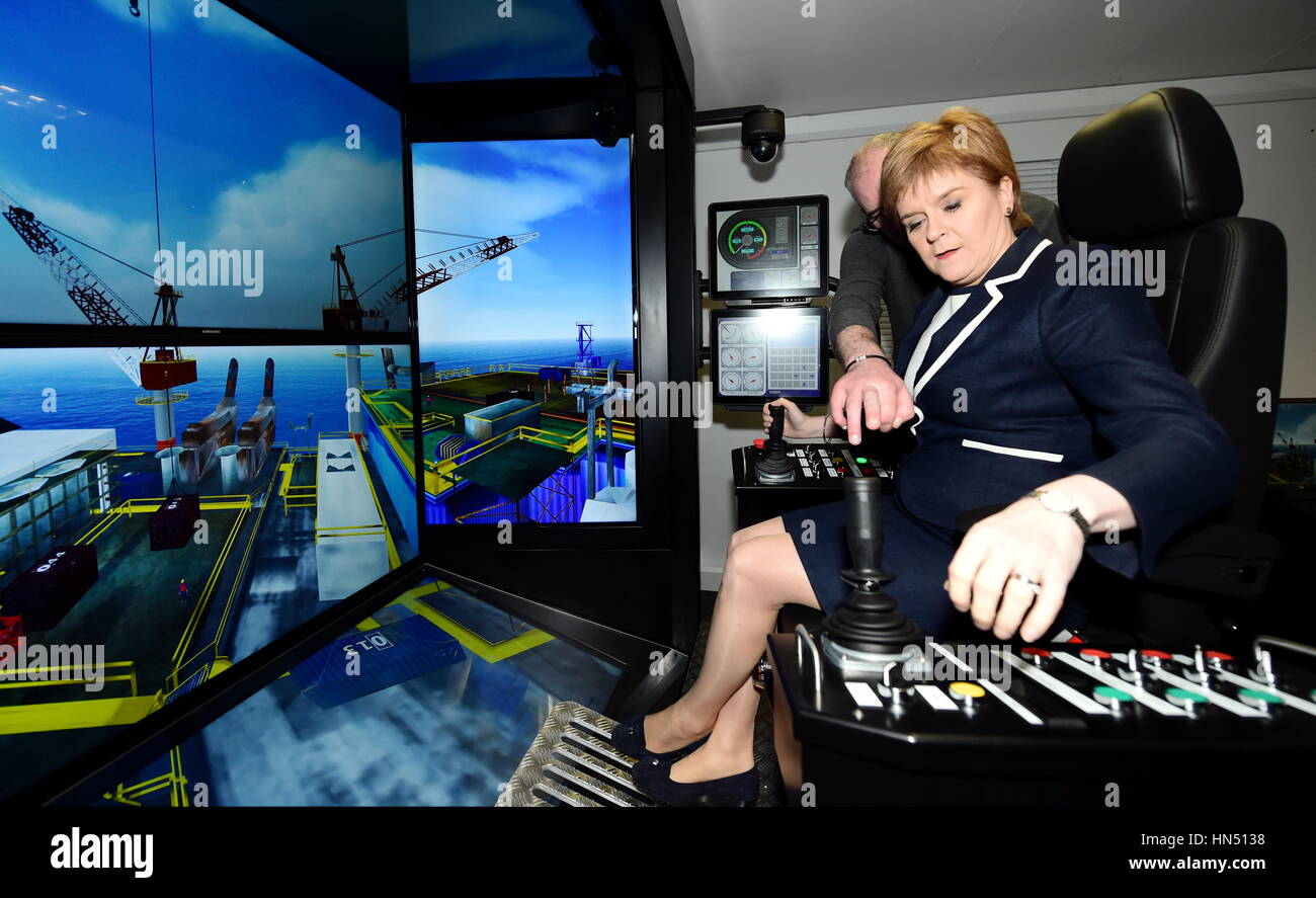 Trevor Dear, Training Centre Supervisor, shows First Minister Nicola ...