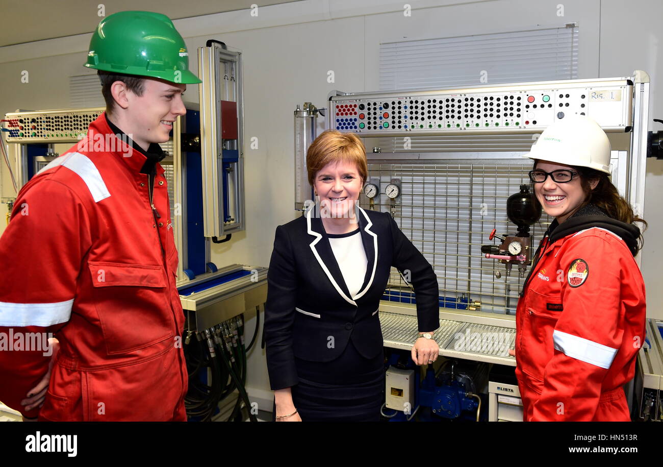 First Minister Nicola Sturgeon (centre) with apprentice's Leanne Brown ...