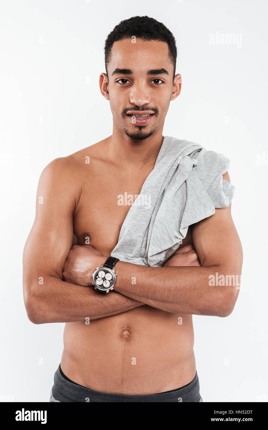 Photo of handsome african man posing over white background and looking ...