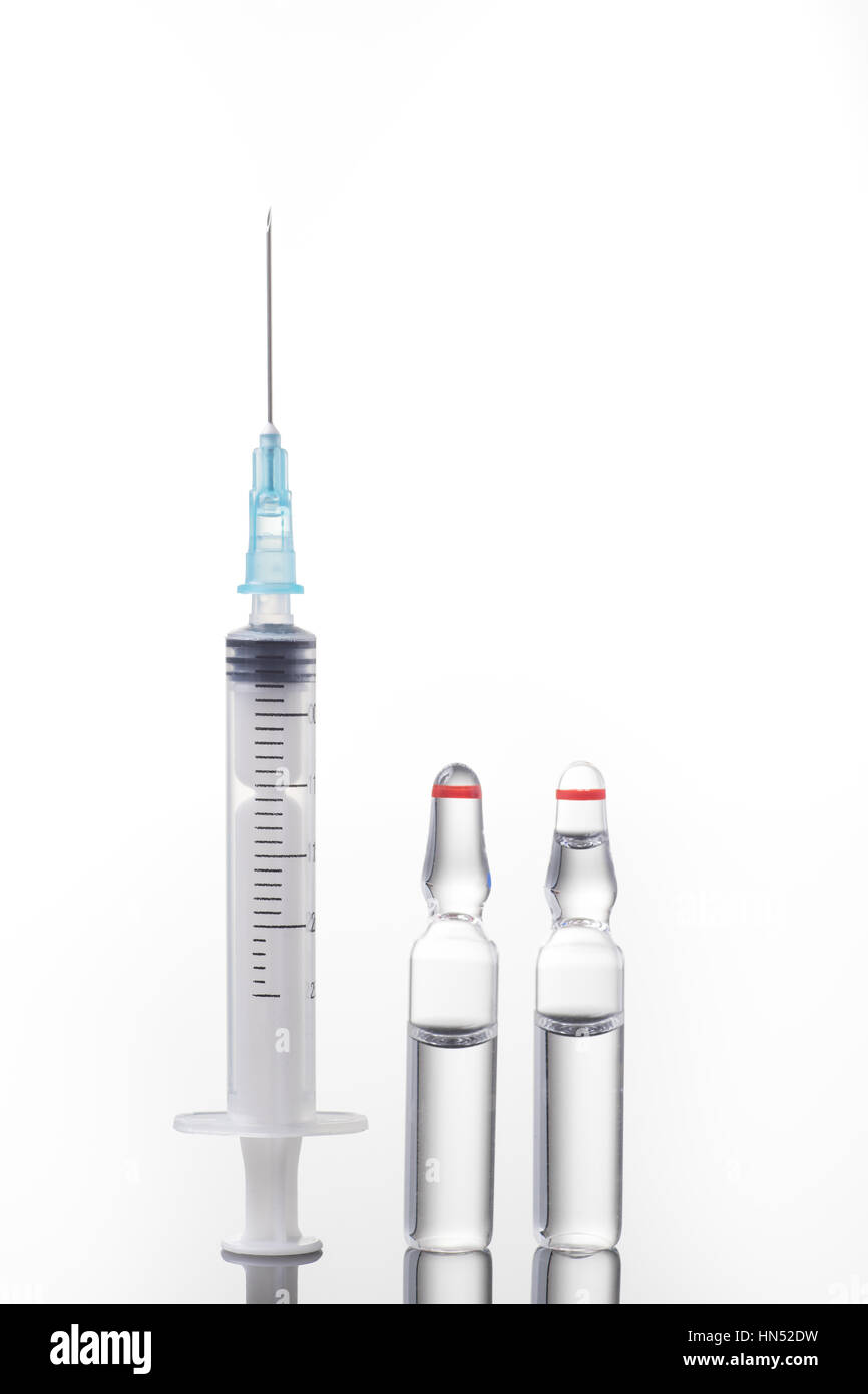 Medicine in vials and syringe , ready for vaccine injection , Cancer ...