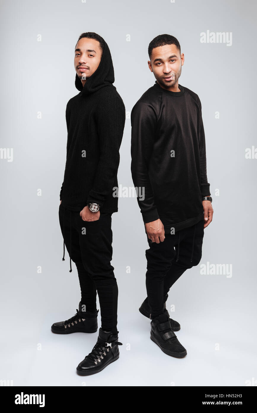 Full length of two handsome african american young men standing Stock ...