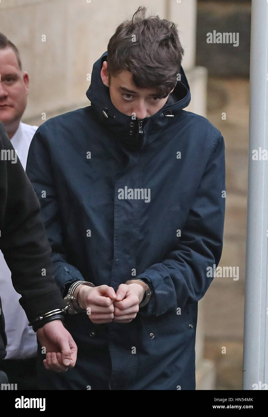 Michael March is escorted in handcuffs from Newcastle Crown Court ...