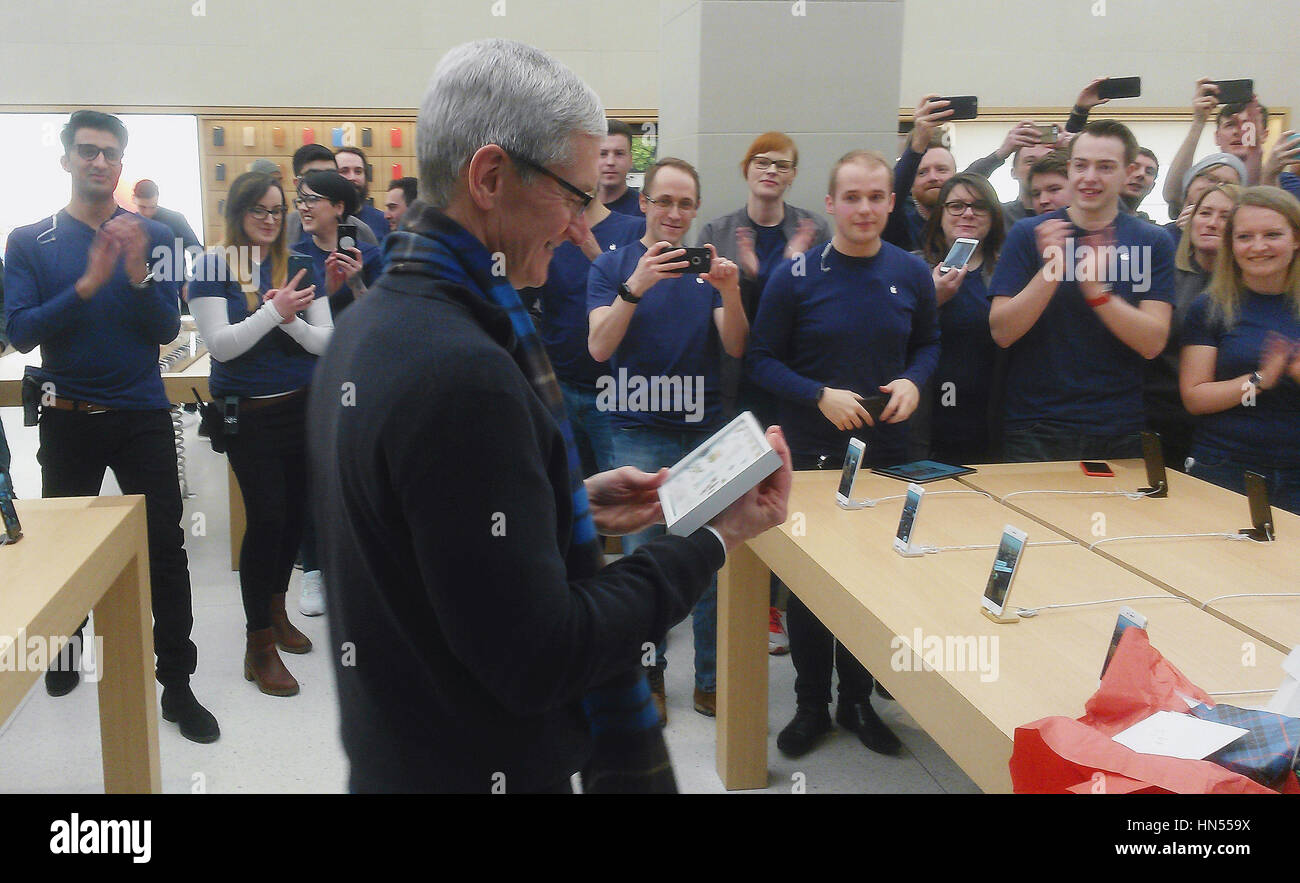 Apple chief executive Tim Cook visits an Apple store in Buchanan Street ...