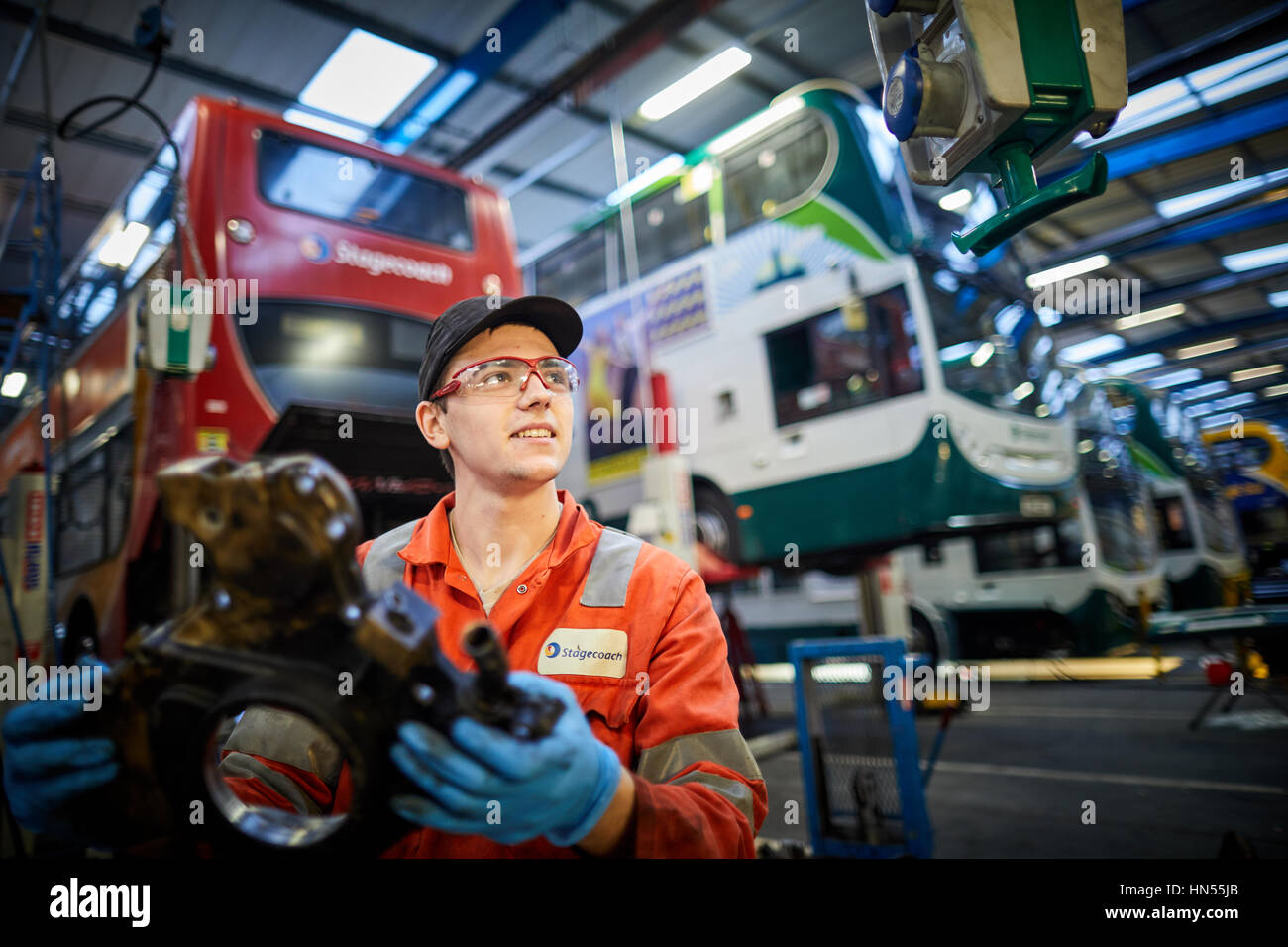 Fixing buses hi-res stock photography and images - Alamy