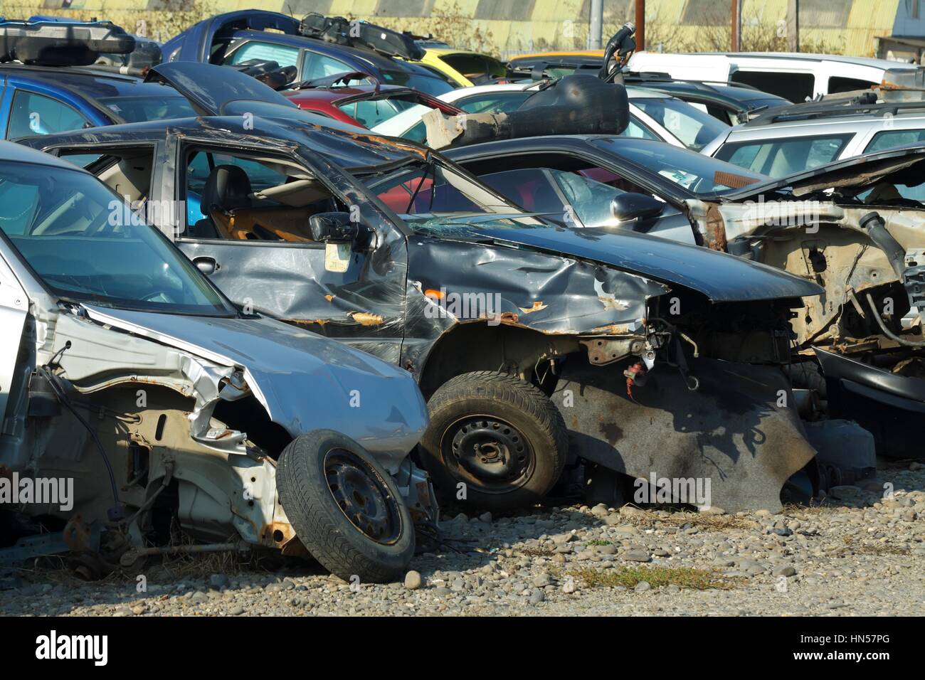 Picture of a smashed cars in a junkyard Stock Photo - Alamy