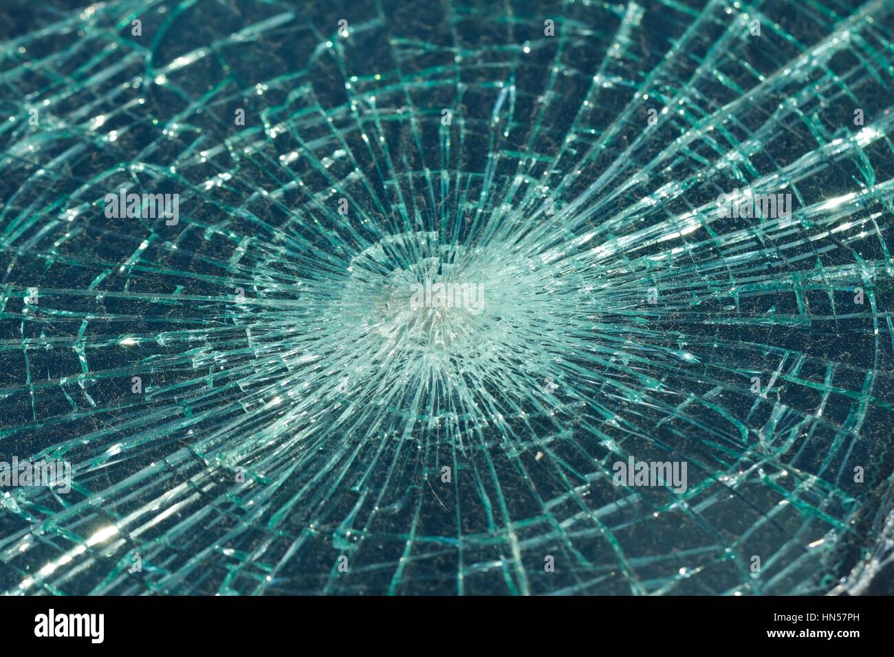 Close up of a smashed car windscreen Stock Photo - Alamy