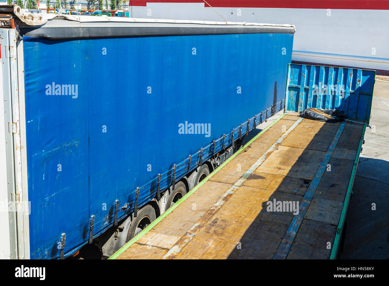 Containers and trailers waiting to board at the port of Barcelona ...