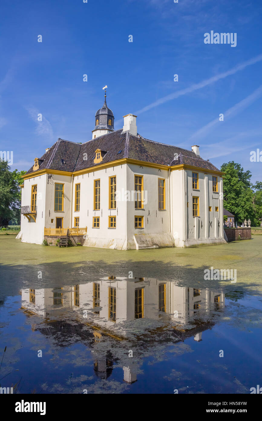 Old dutch mansion Fraeylemaborg with reflection in the water in ...