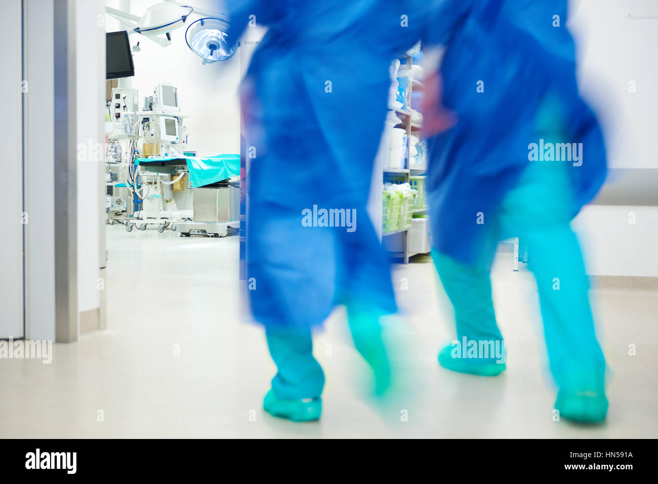 Doctors running in a hurry Stock Photo - Alamy