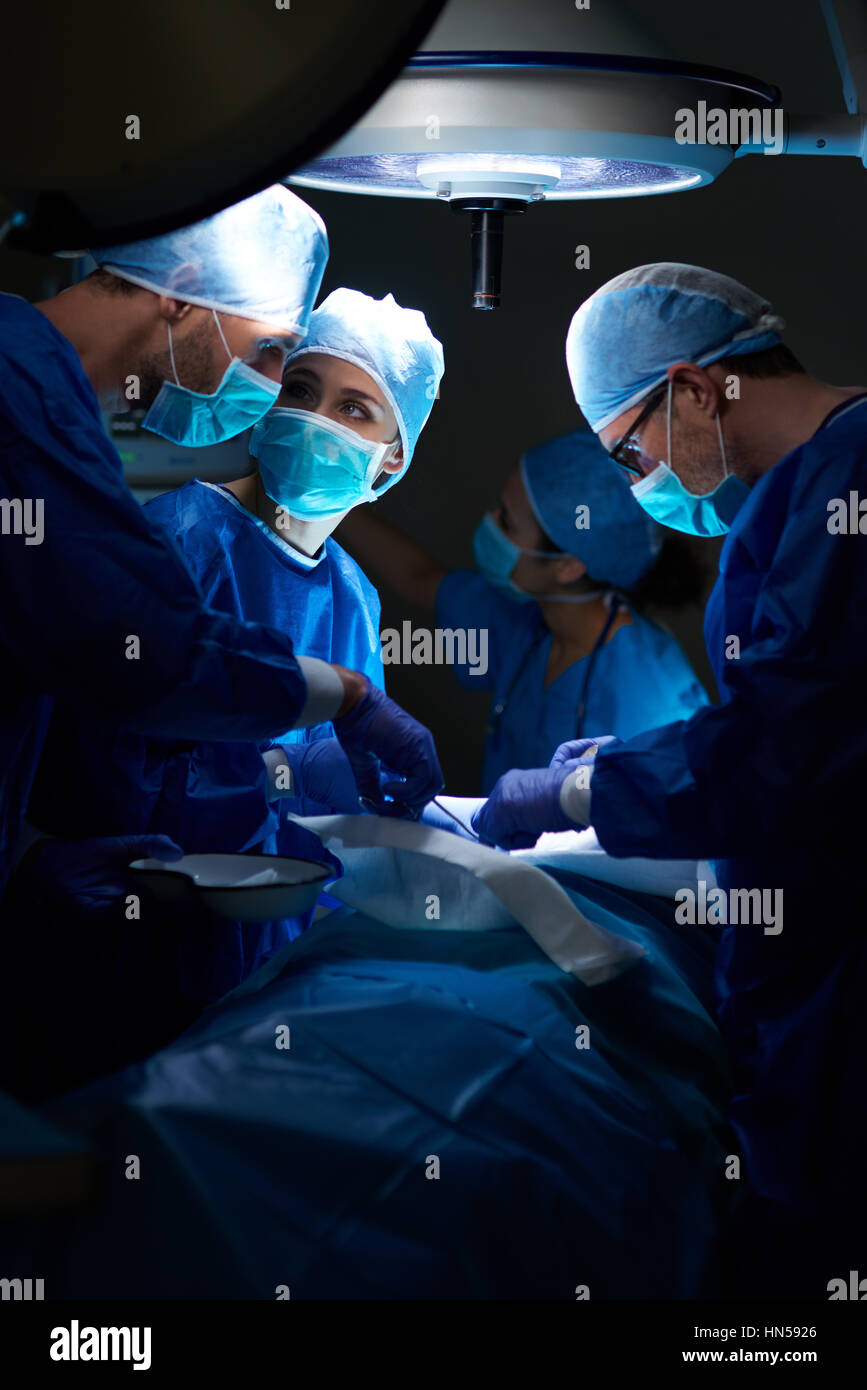 Team of surgeons making important operation Stock Photo - Alamy