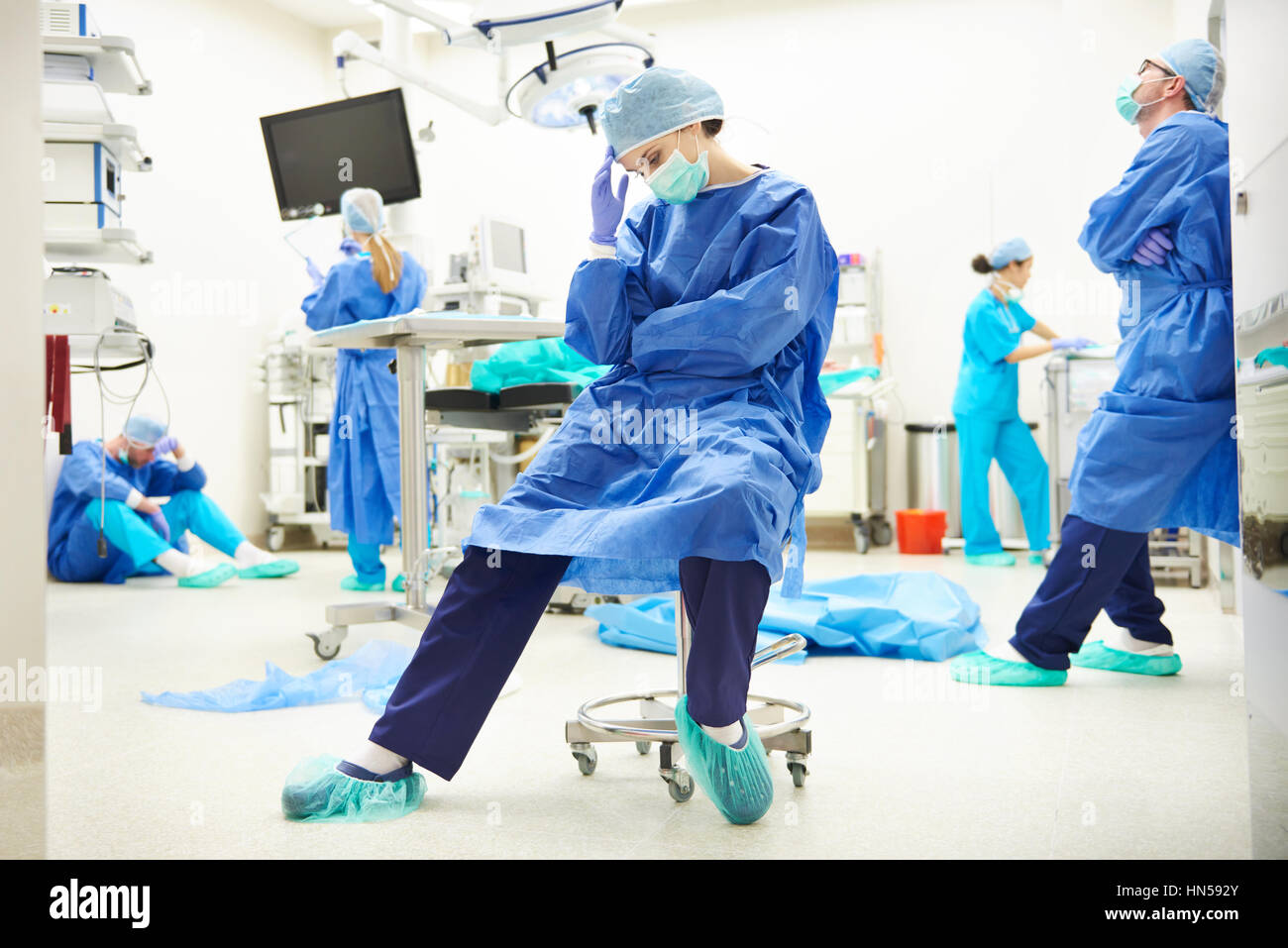 Surgical team tired after operation hi-res stock photography and images ...