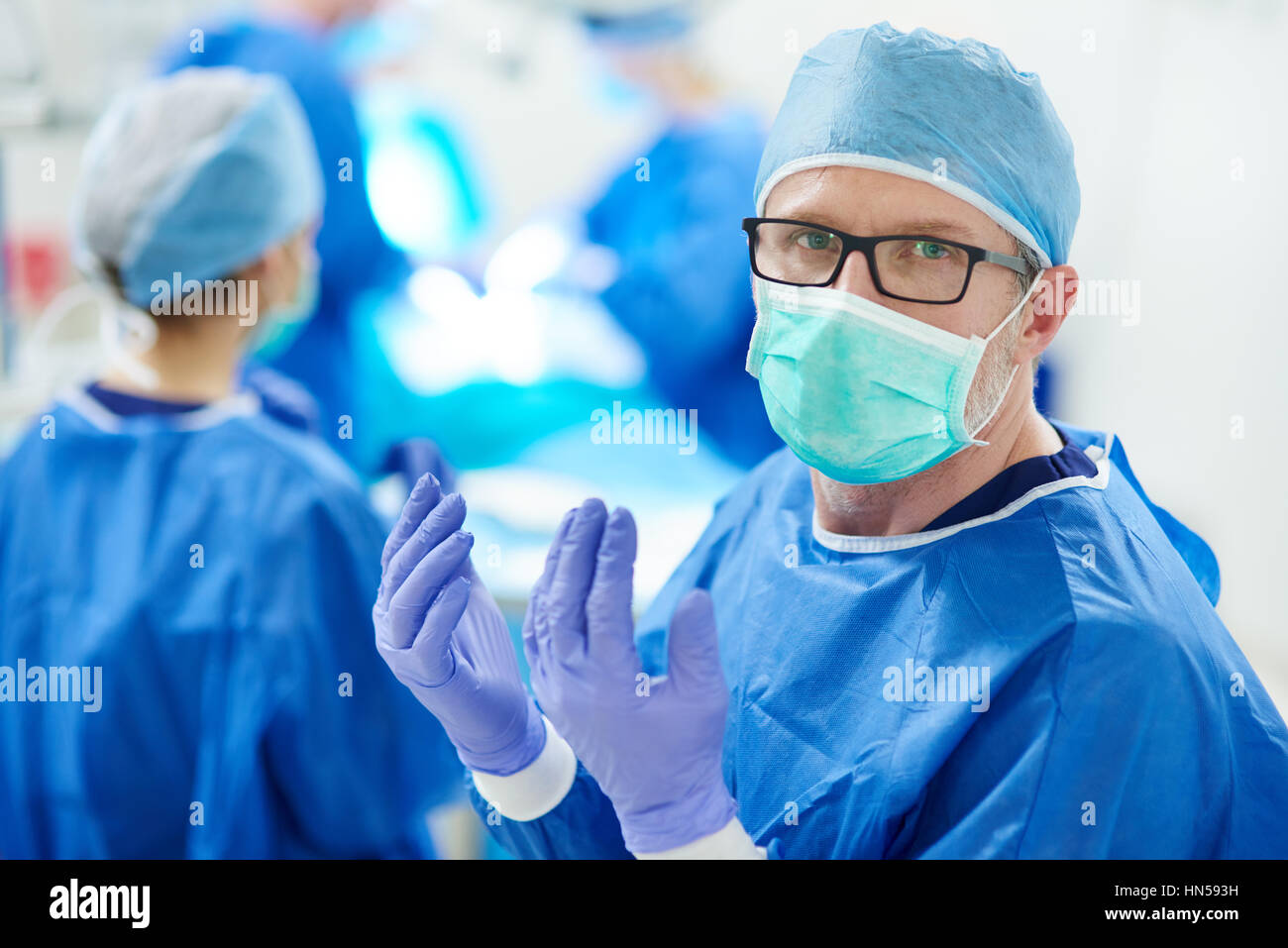 Surgeon ready for the next operation Stock Photo - Alamy