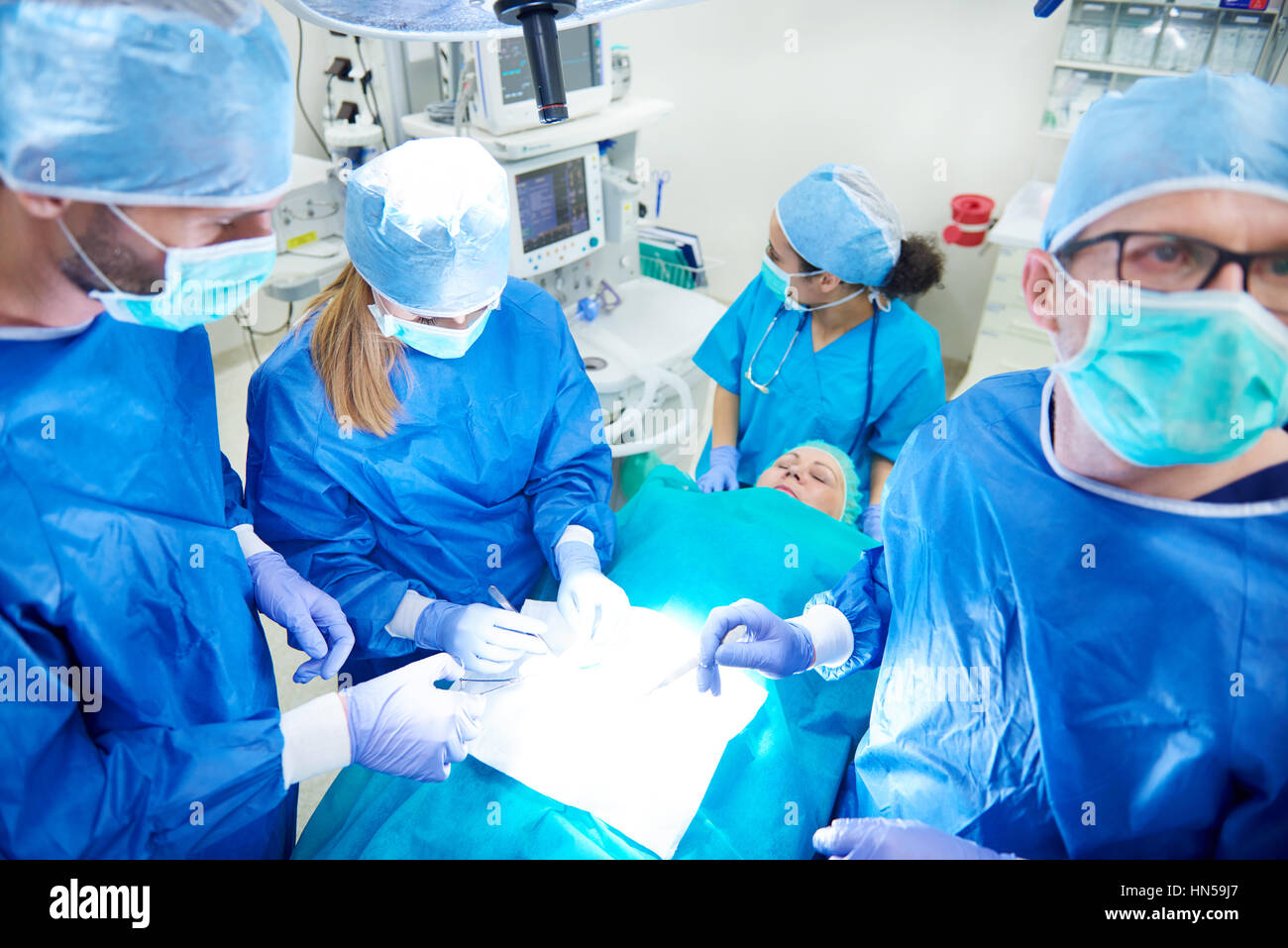 Woman operating table hospital hi-res stock photography and images - Alamy