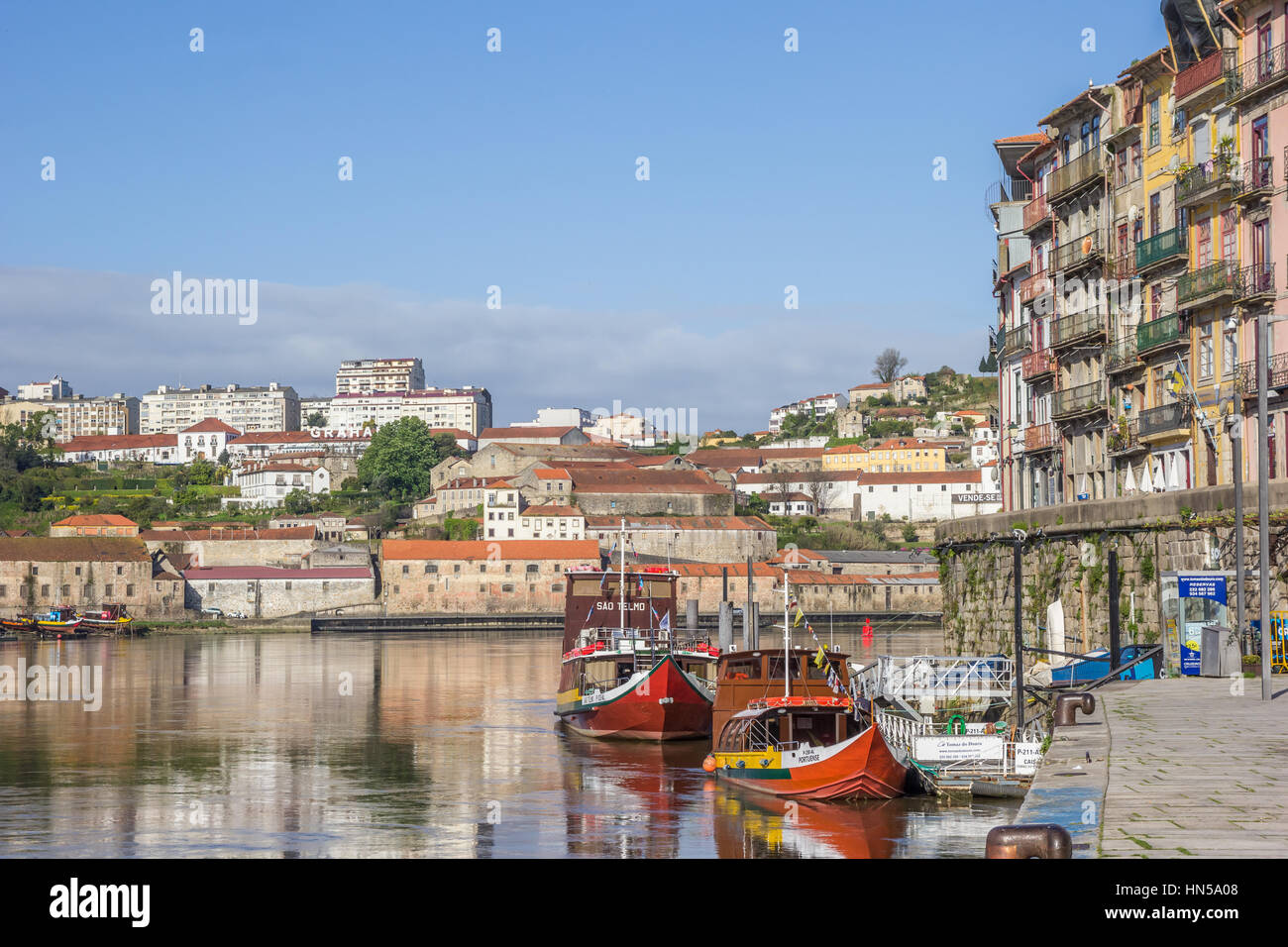 Boats at the Ribeira quay in Porto, Portugal Stock Photo - Alamy