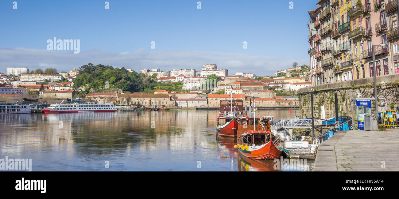 Panorama of boats at the Ribeira quay in Porto, Portugal Stock Photo ...