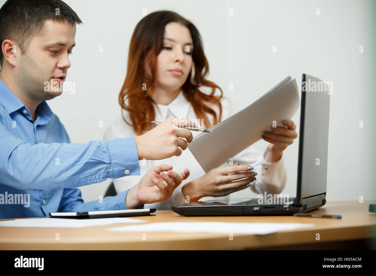 Businesspeople working with computer Stock Photo - Alamy