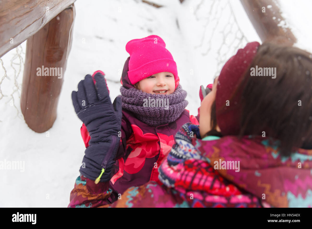 Young mom carrying daughter hi-res stock photography and images - Alamy