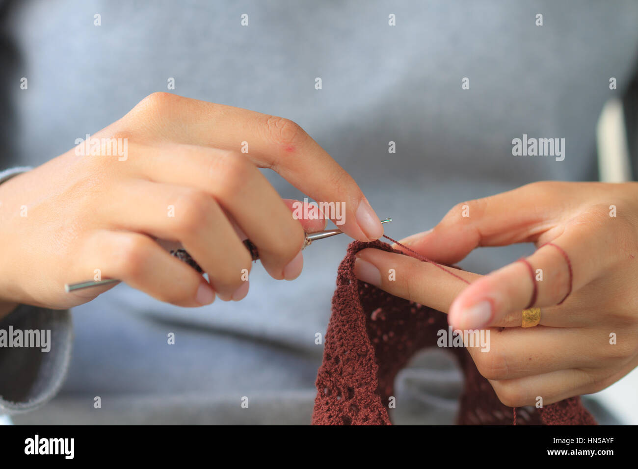Crocheting woman hi-res stock photography and images - Alamy