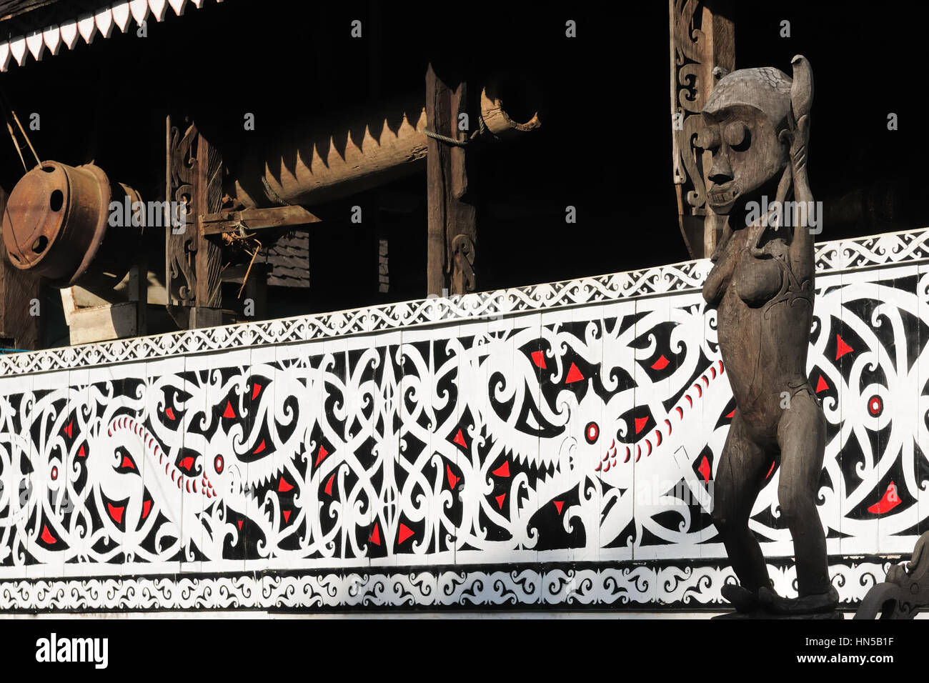 Traditional Dayak tribal culture. Detail Dayak house - longhouse in ...