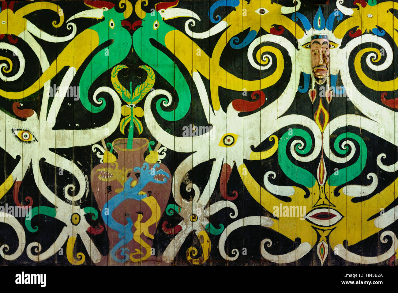 Traditional Dayak tribal culture. Ancient detail painting of the Dayak ...