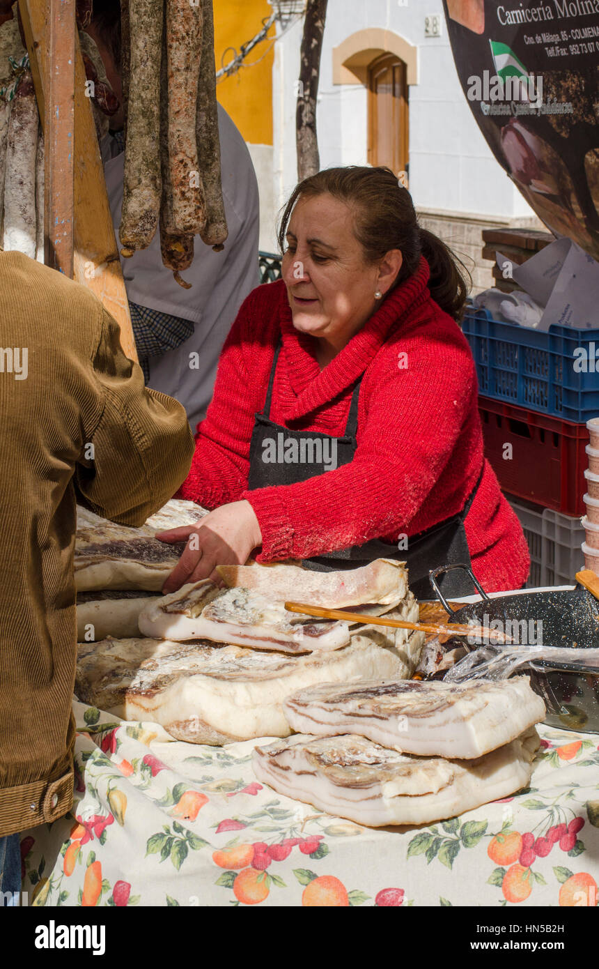 Woman selling lard, pork belly fat, at Fiesta de matanza, Annual ...