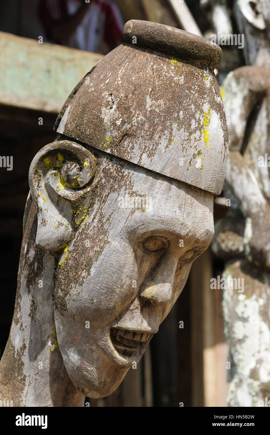 Traditional Dayak tribal culture. Detail Dayak (wooden totem) house ...