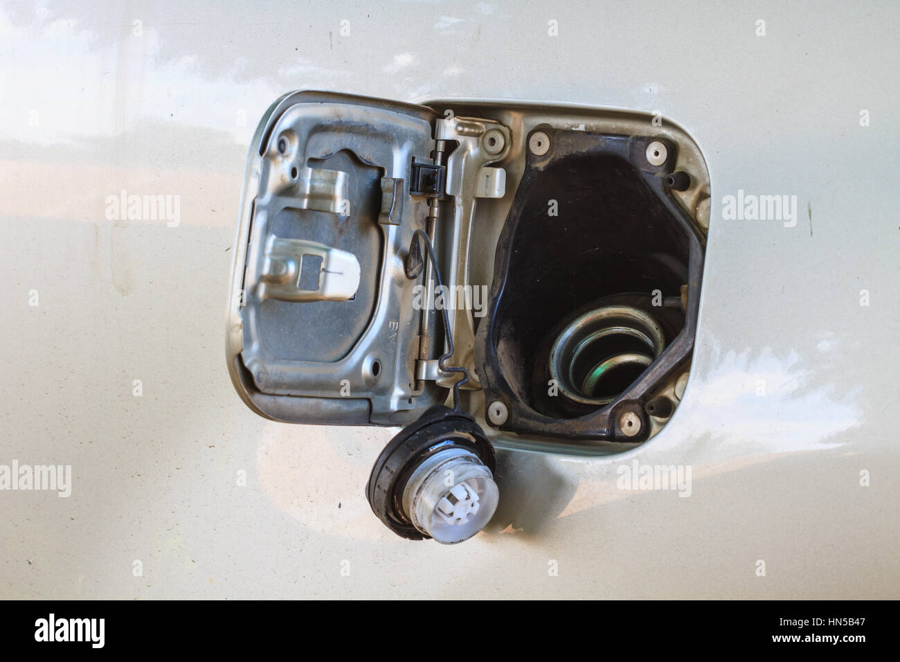 cap oil tank cars, Petrol cap cover Stock Photo - Alamy