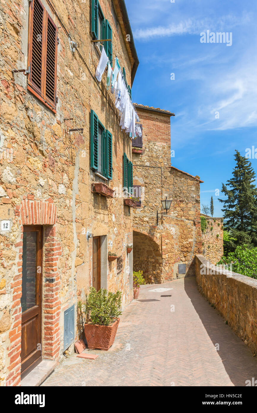 Walkway on a terrace at a residential building in an Italian village ...