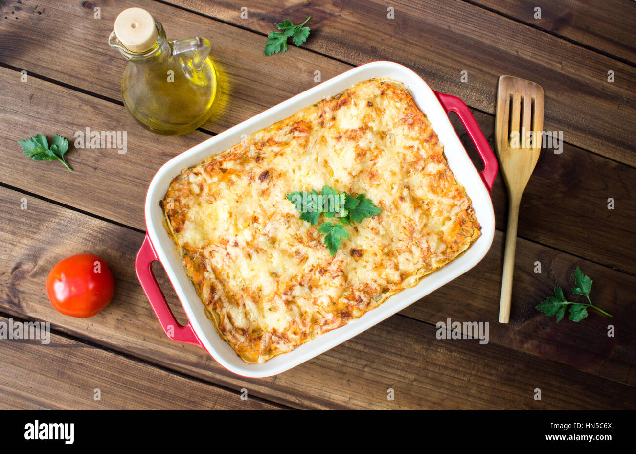 Homemade Meat lasagna with ingredients on wooden table Stock Photo - Alamy