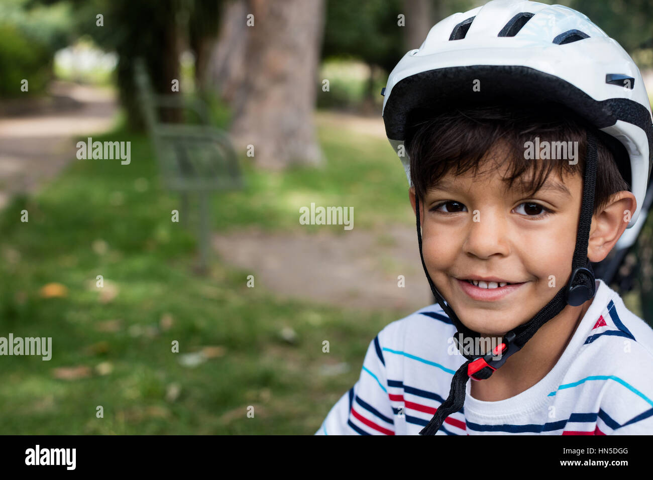 Boy on bicycle wearing helmet hi-res stock photography and images - Alamy