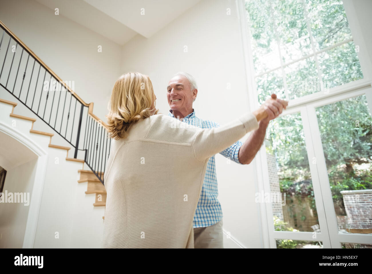 Elderly dancing living room hi-res stock photography and images - Alamy