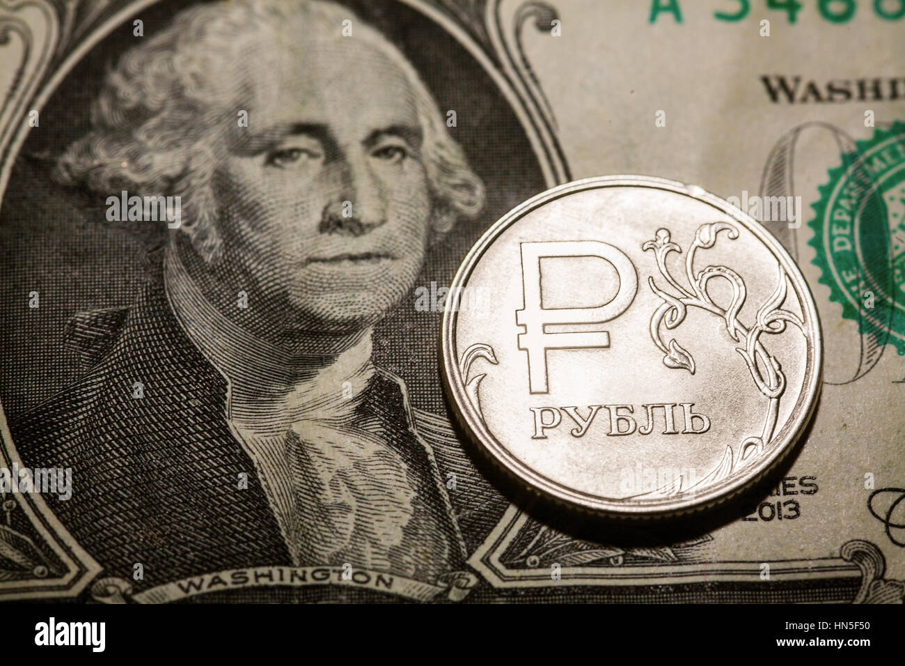 One ruble coin on dollar banknote. Closeup, macro shot Stock Photo - Alamy