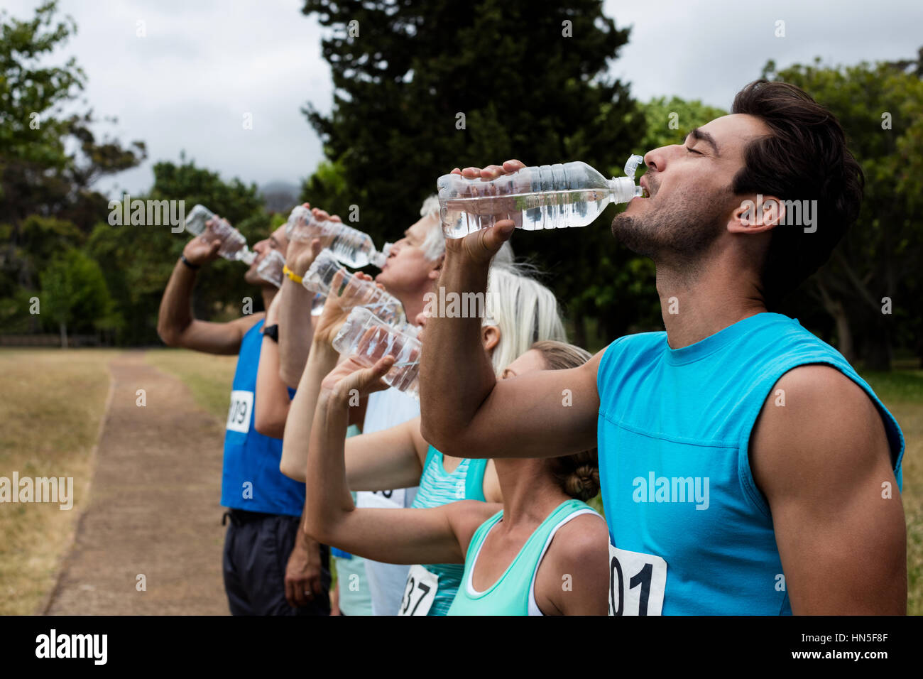 Drinking athletes hi-res stock photography and images - Alamy