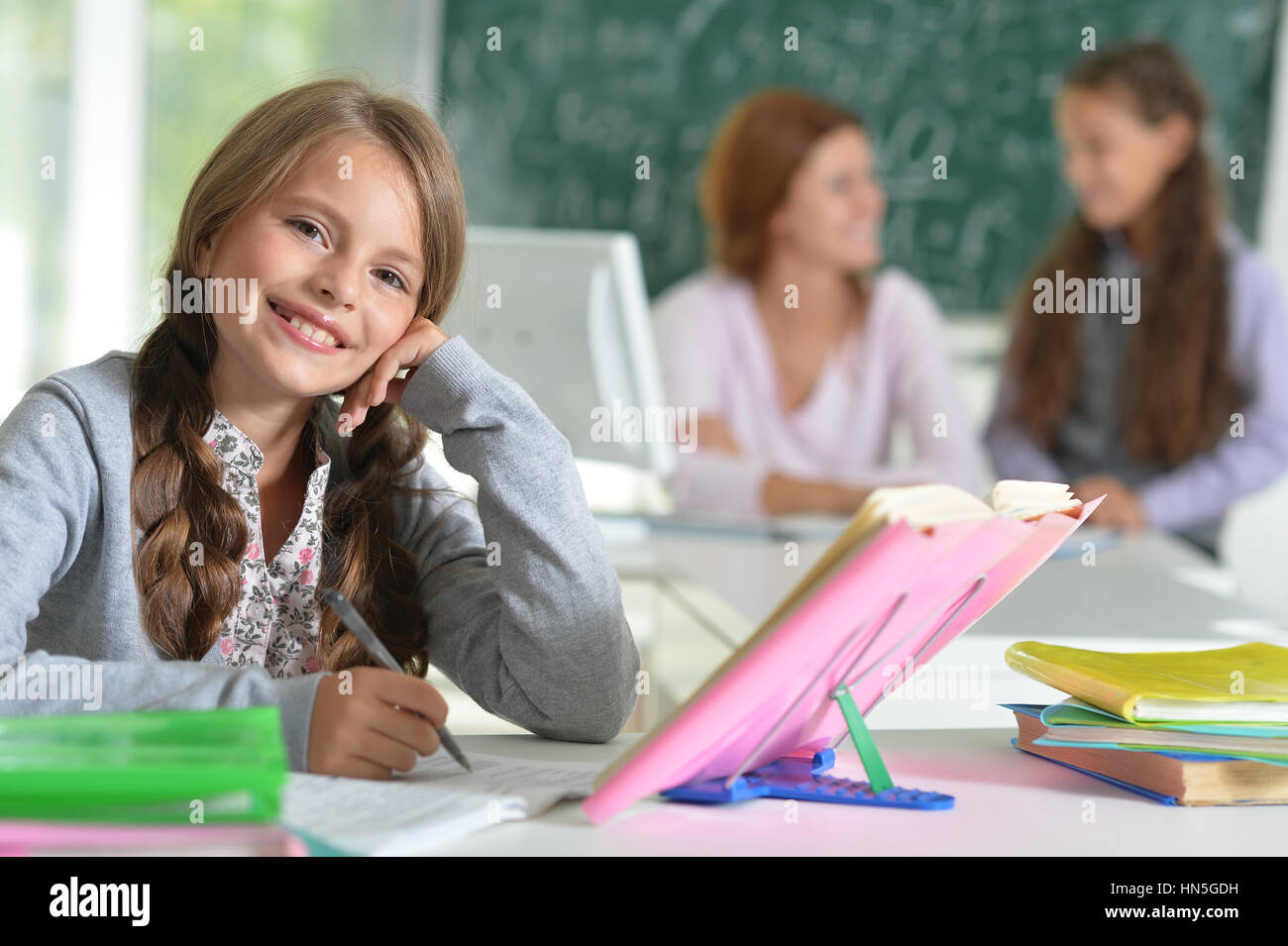 Girls education lesson class globe hi-res stock photography and images ...