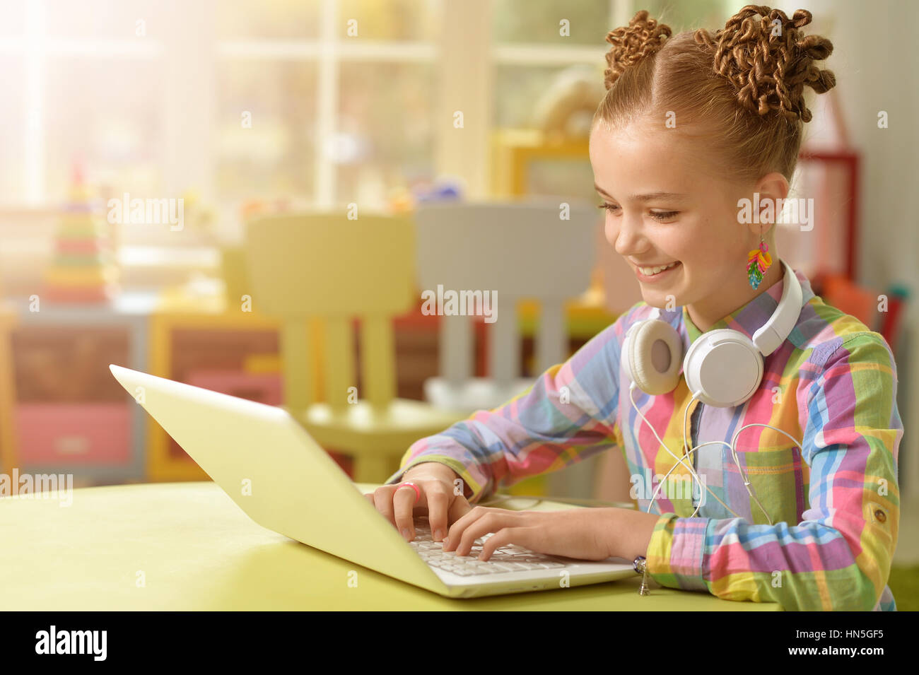 cute little girl using laptop Stock Photo - Alamy
