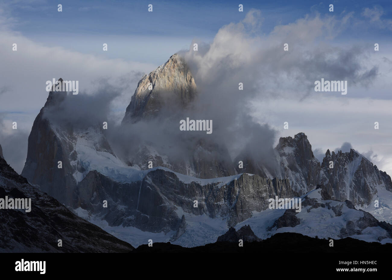 Mount Fitz Roy, center top, is visible at sunrise in Patagonia ...