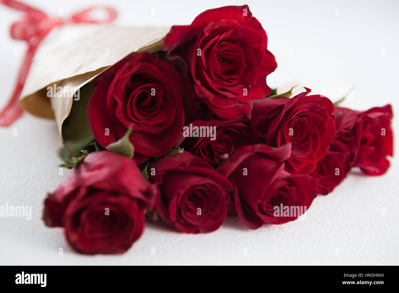 Bunch of red roses on white background Stock Photo - Alamy