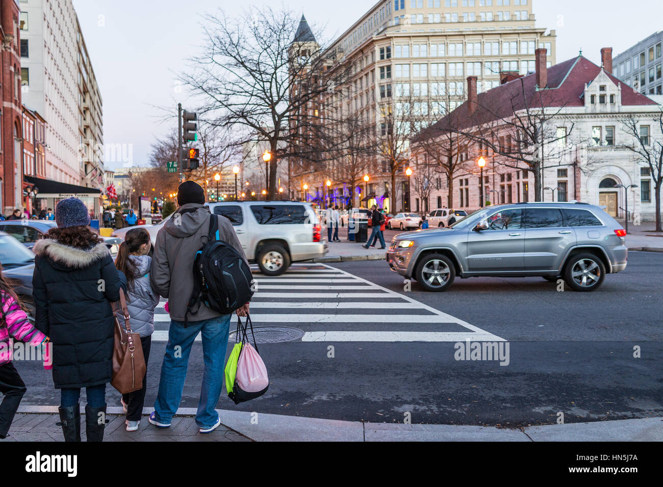 Washington DC, USA - December 29, 2016: People waiting to cross street ...