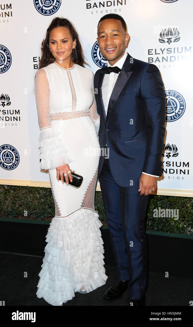 Chrissy Teigen and John Legend attending The Art of Elysium presents ...